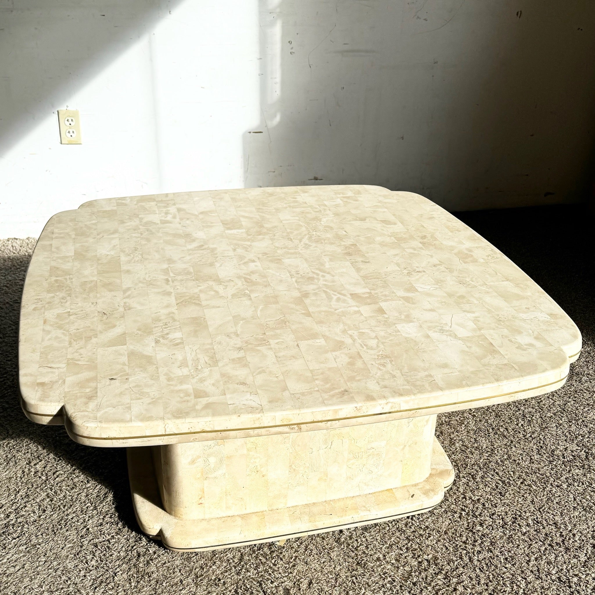 Postmodern Polished Tessellated Stone Sculpted Coffee Table With Brass Inlay