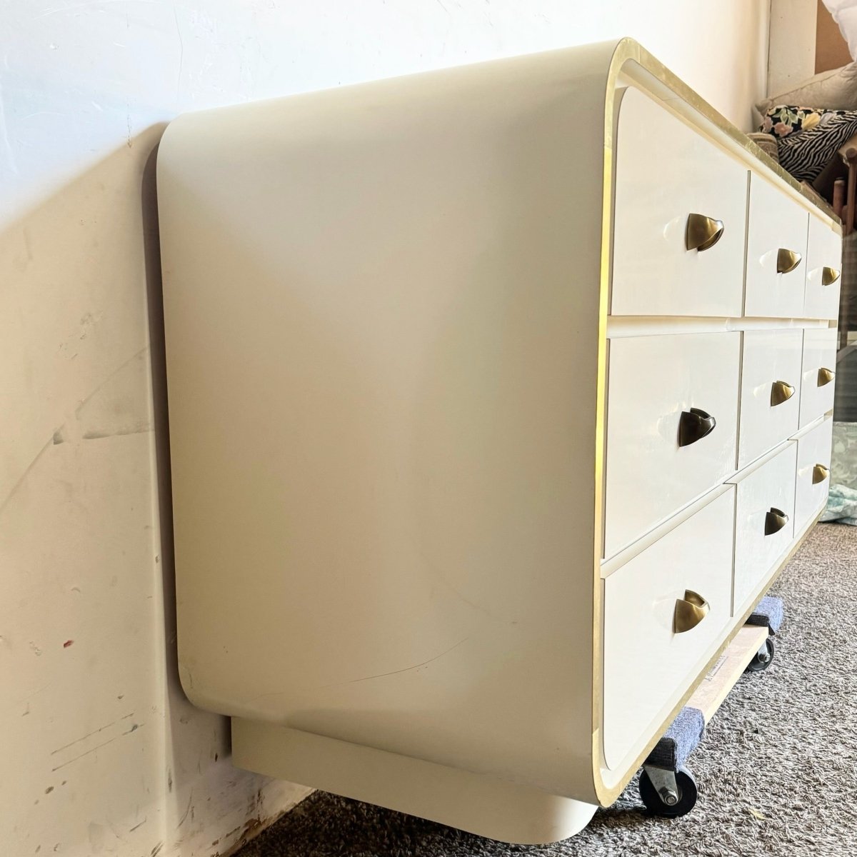 Postmodern Cream Lacquer Laminate Waterfall Dresser With Gold Accents